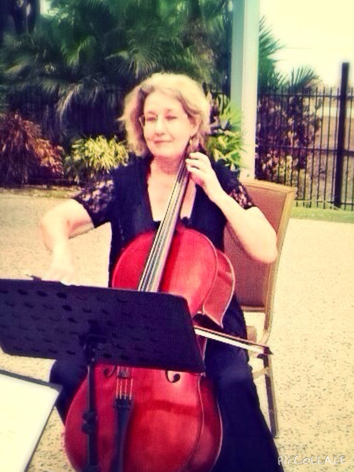 Cathy-playing-cello-2015-photo - Cathy Applegate